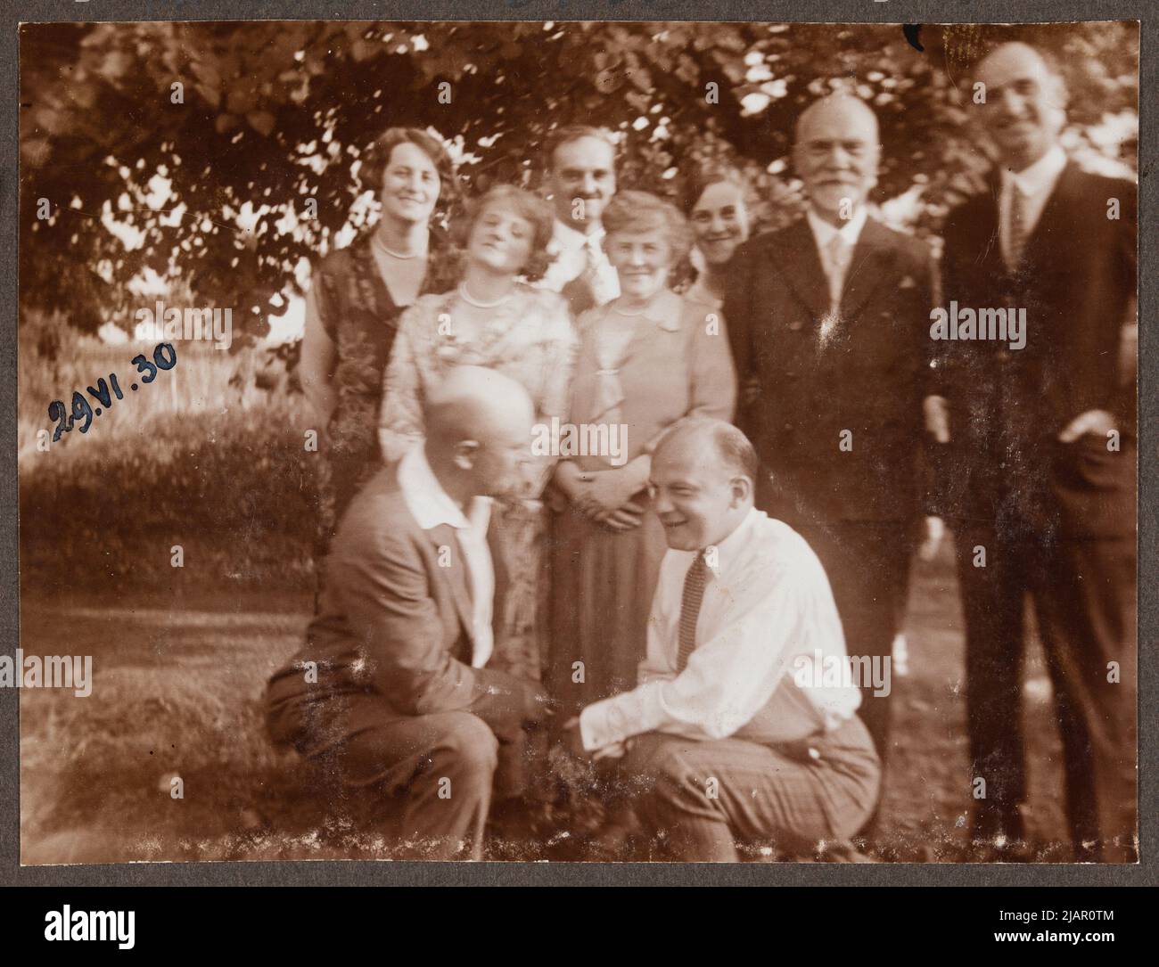 Stachiewiczów Piotr and his son Roman among friends in the garden ...