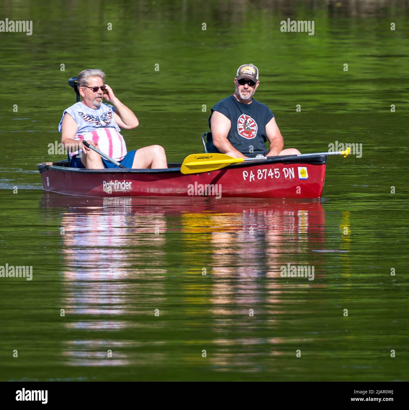 Two men in a canoe on the Allegheny River in Pennsylvania, USA Stock ...