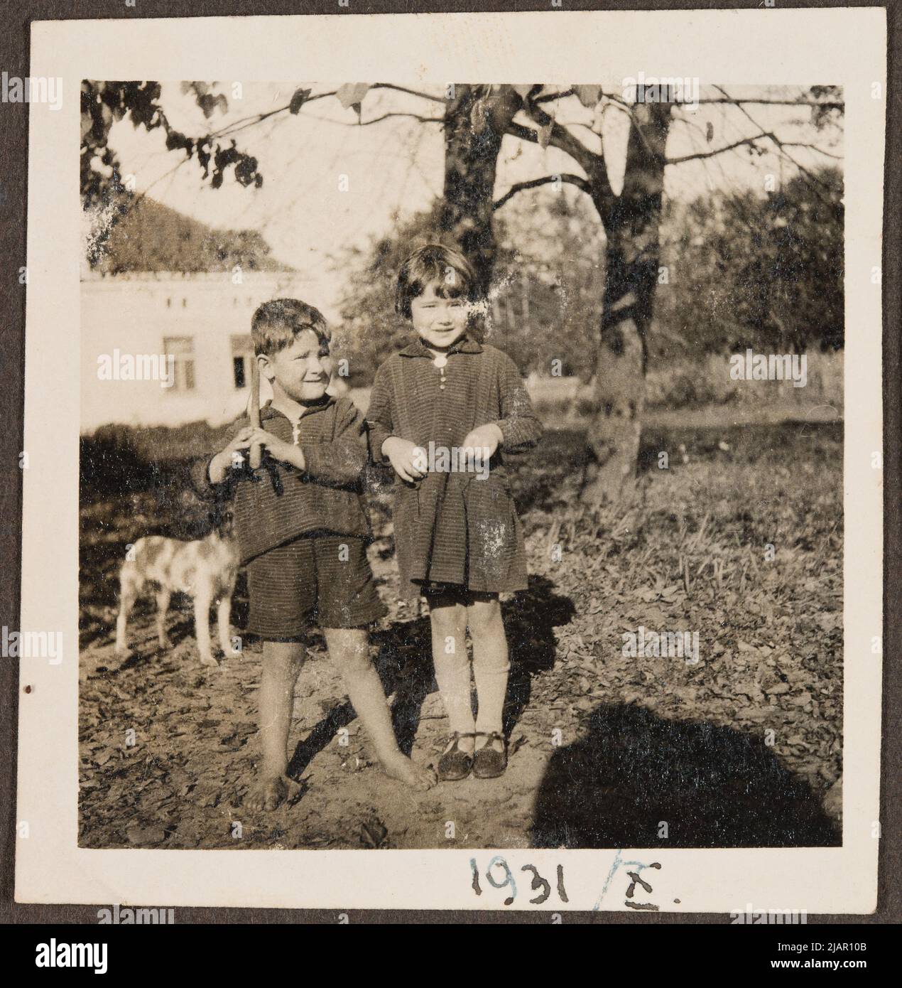 Stachiewicz Bronisława and Roman in Chorzelów with a dog against the ...