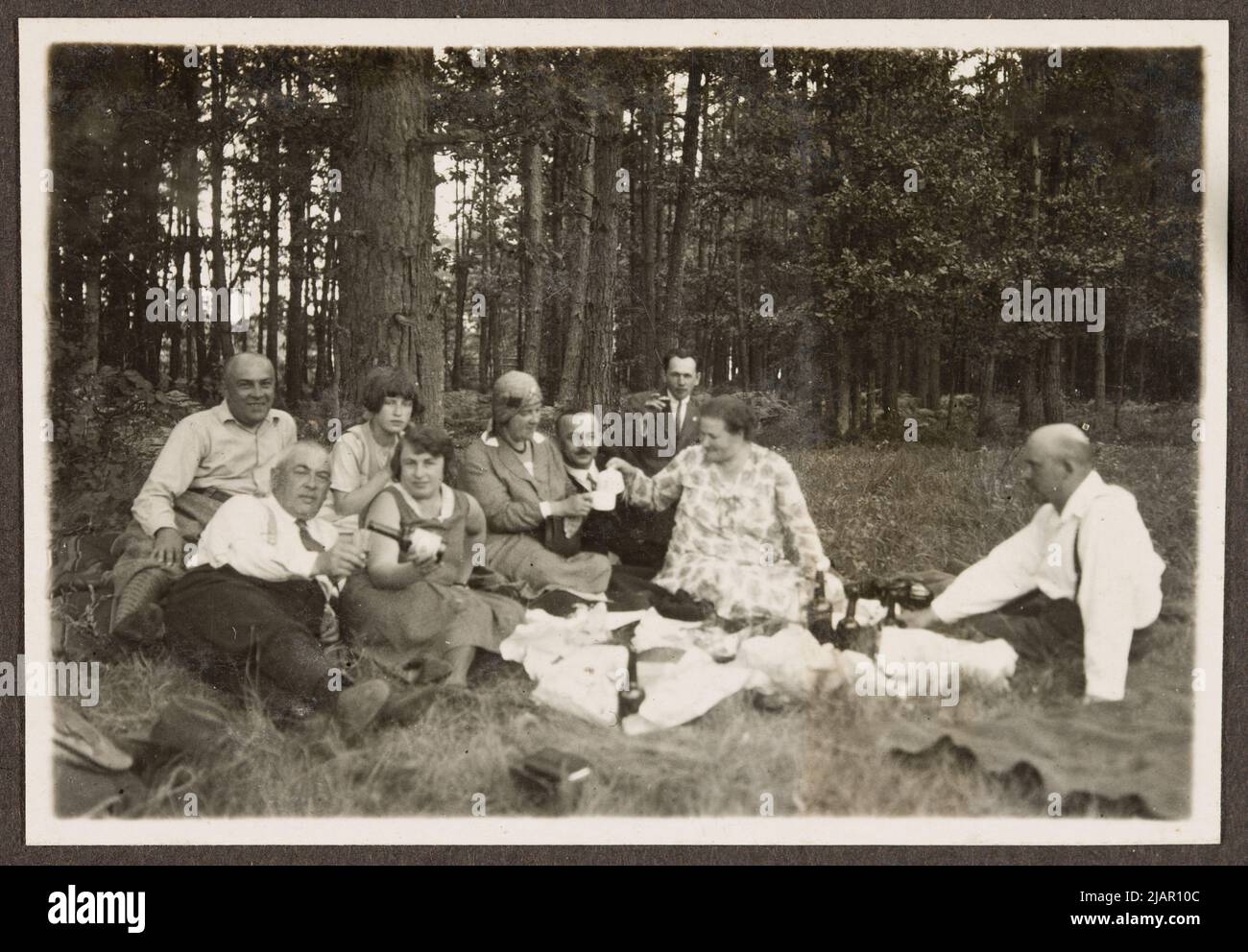Stachiewicz Roman in a group of people during a picnic in the forest ...