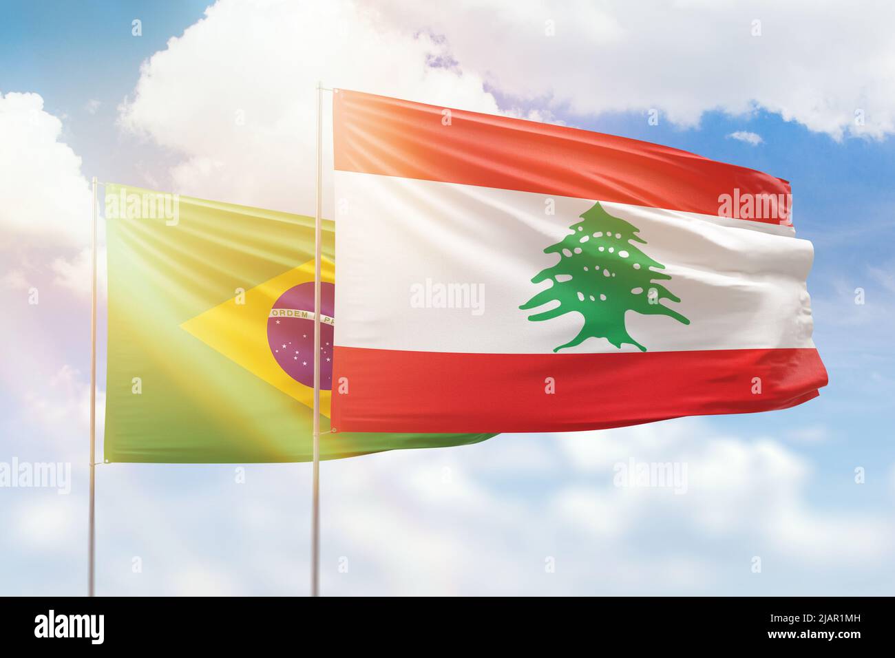 Sunny blue sky and flags of lebanon and brazil Stock Photo - Alamy