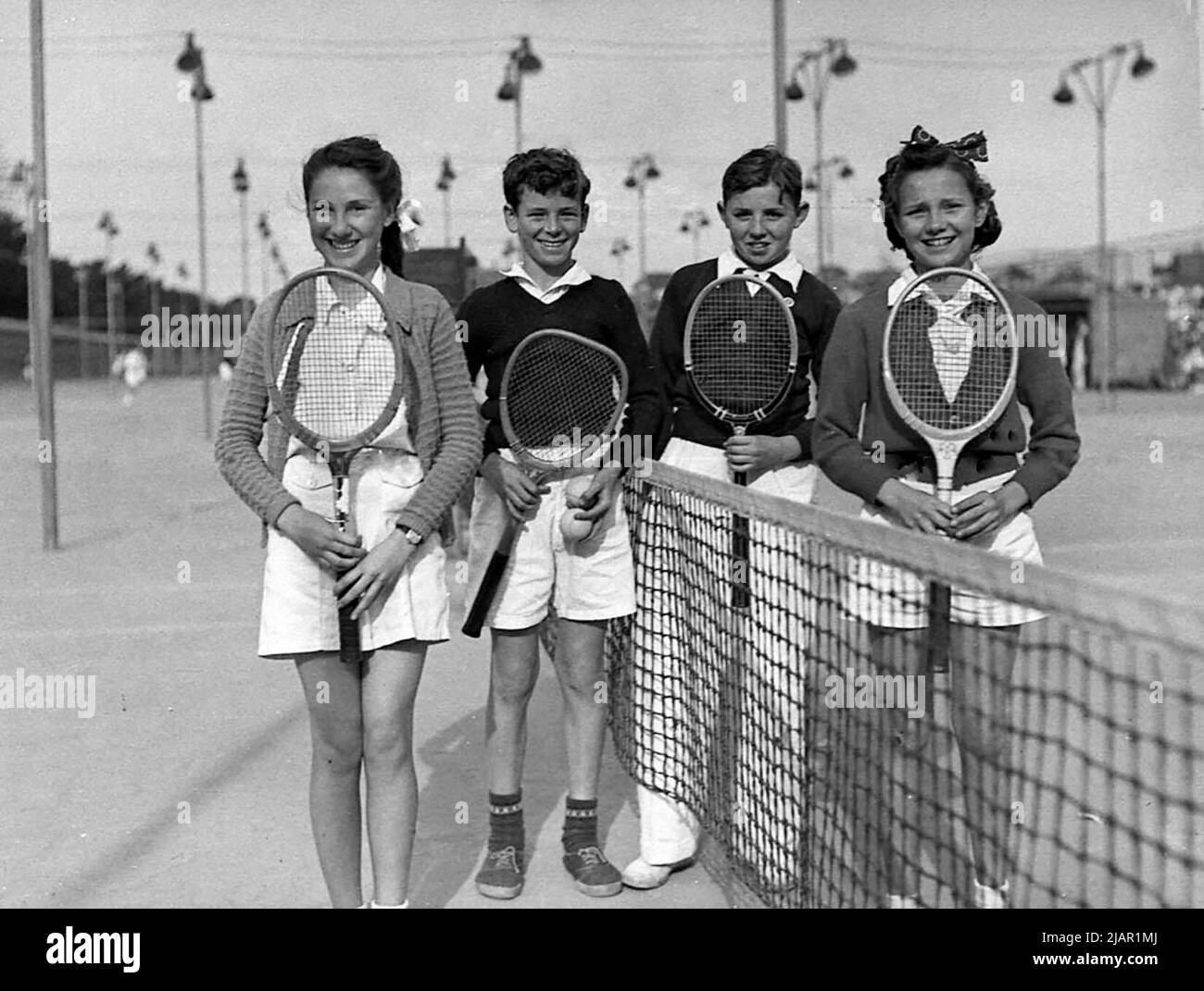 Kids tennis Black and White Stock Photos & Images - Alamy