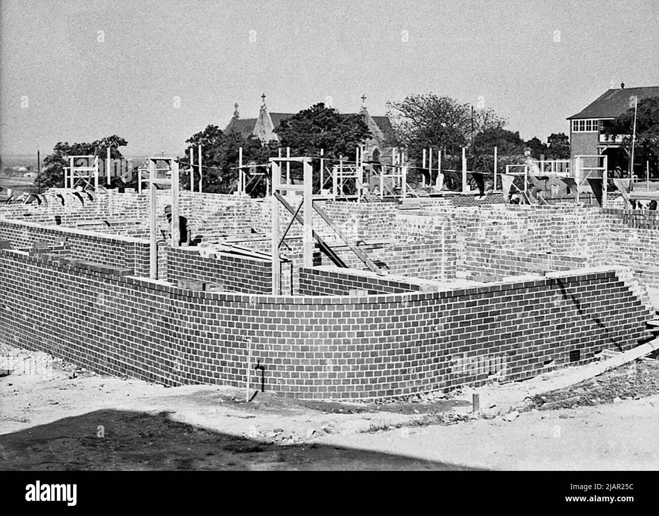 Building construction, brick walls ca. 1935 Stock Photo - Alamy