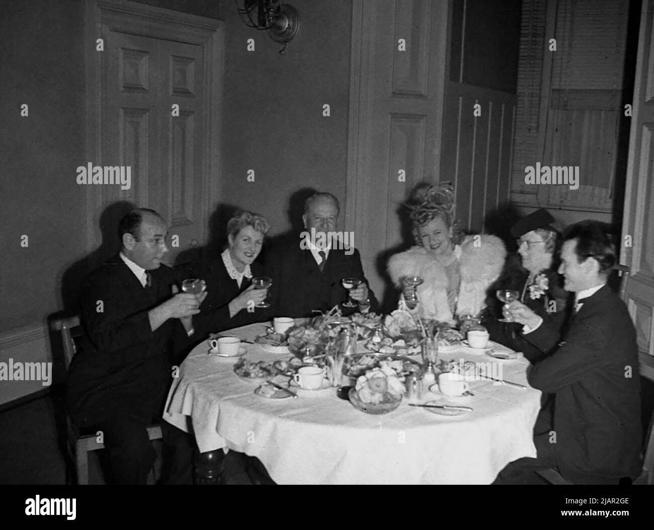 1940s making a toast hi-res stock photography and images - Alamy