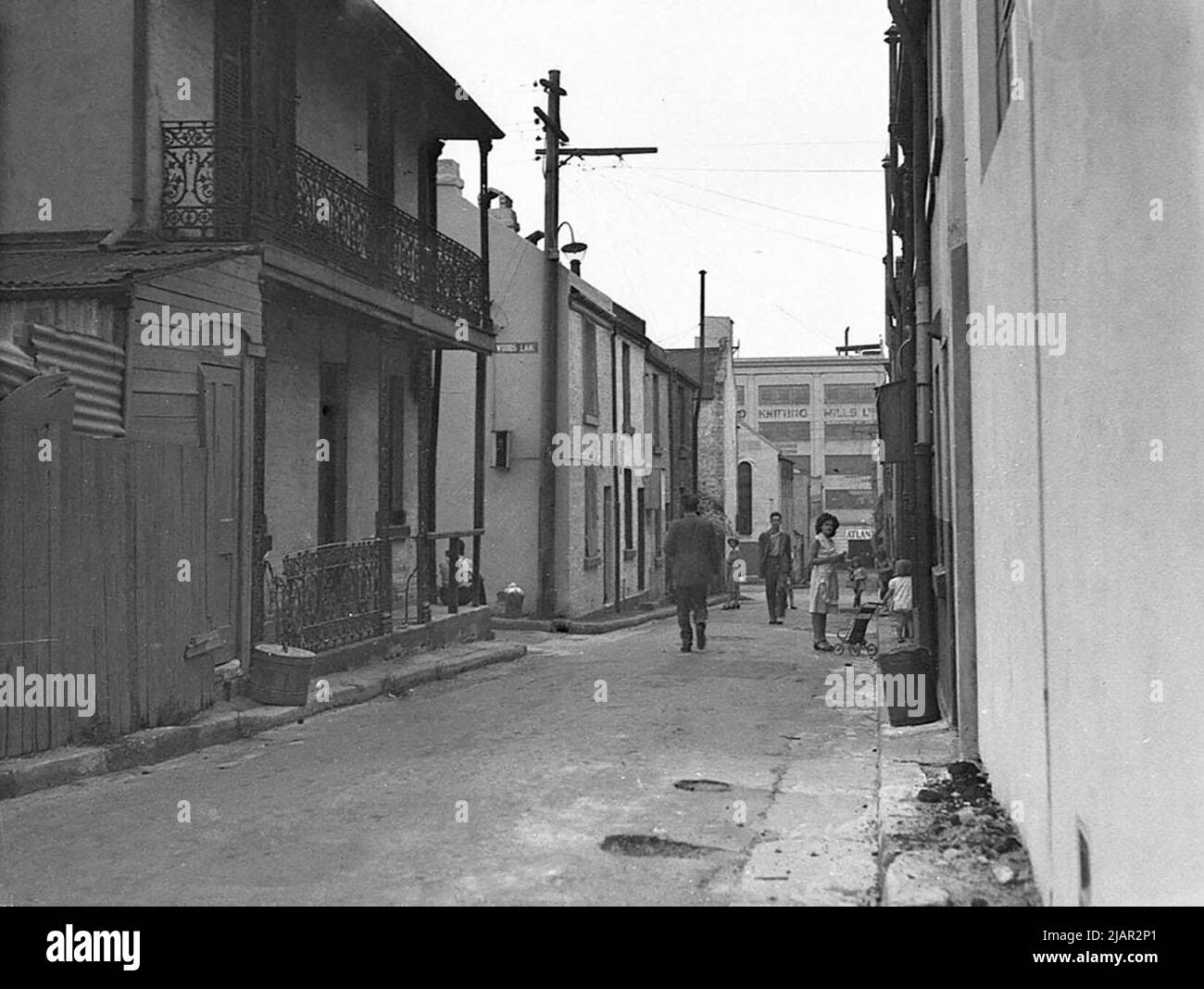 People walking in slums in Woolloomooloo ca. 1947 Stock Photo - Alamy