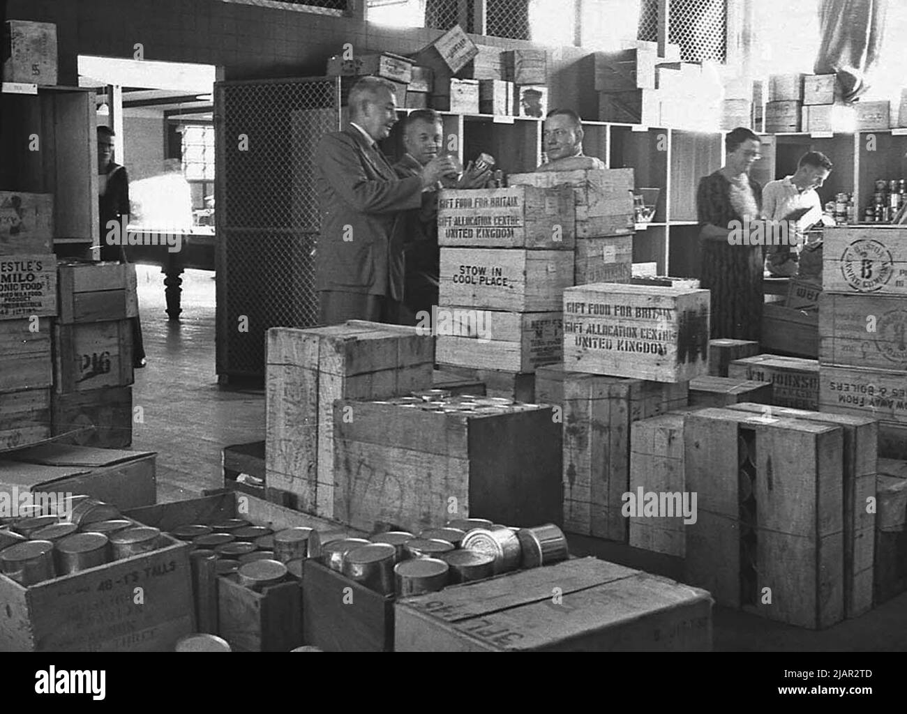 Boxes of food prepared to send to post-war Britain ca. 1946 Stock Photo ...