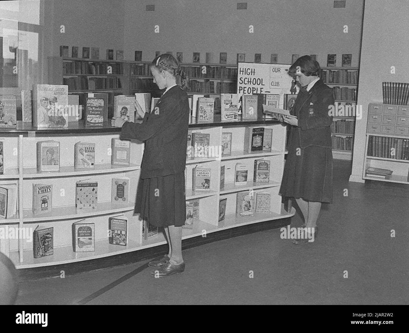 Library book display for Book Week ca. 1954 Stock Photo - Alamy