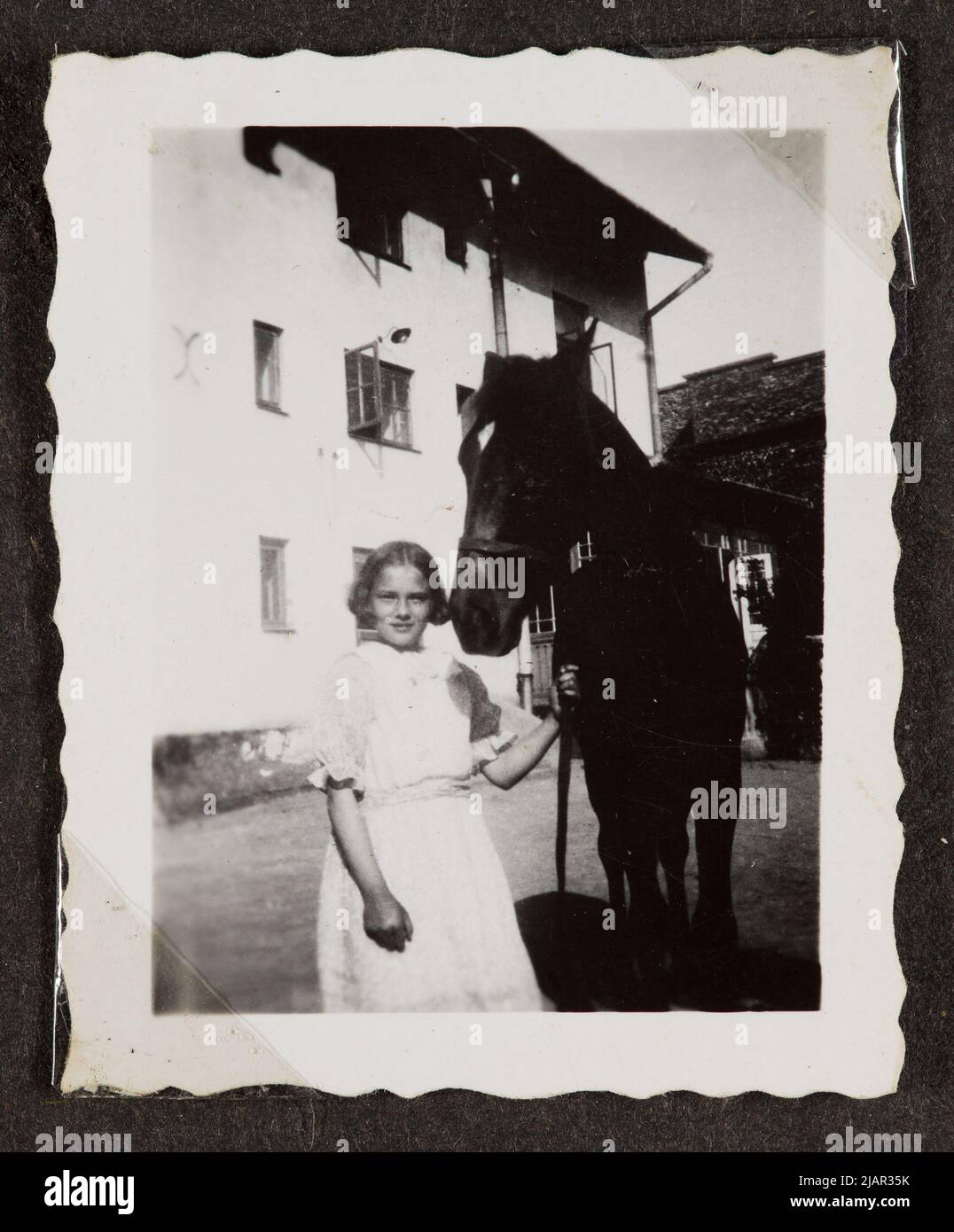 Stachiewiczówna Bronisława standing next to the horse held as a bridle ...
