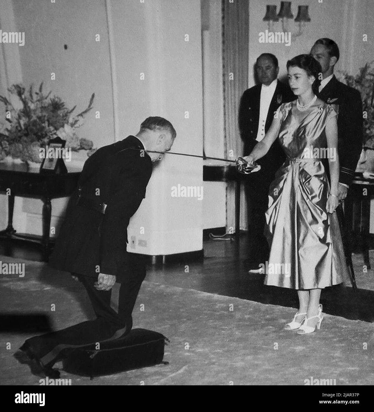 Queen elizabeth beknighting hi-res stock photography and images - Alamy