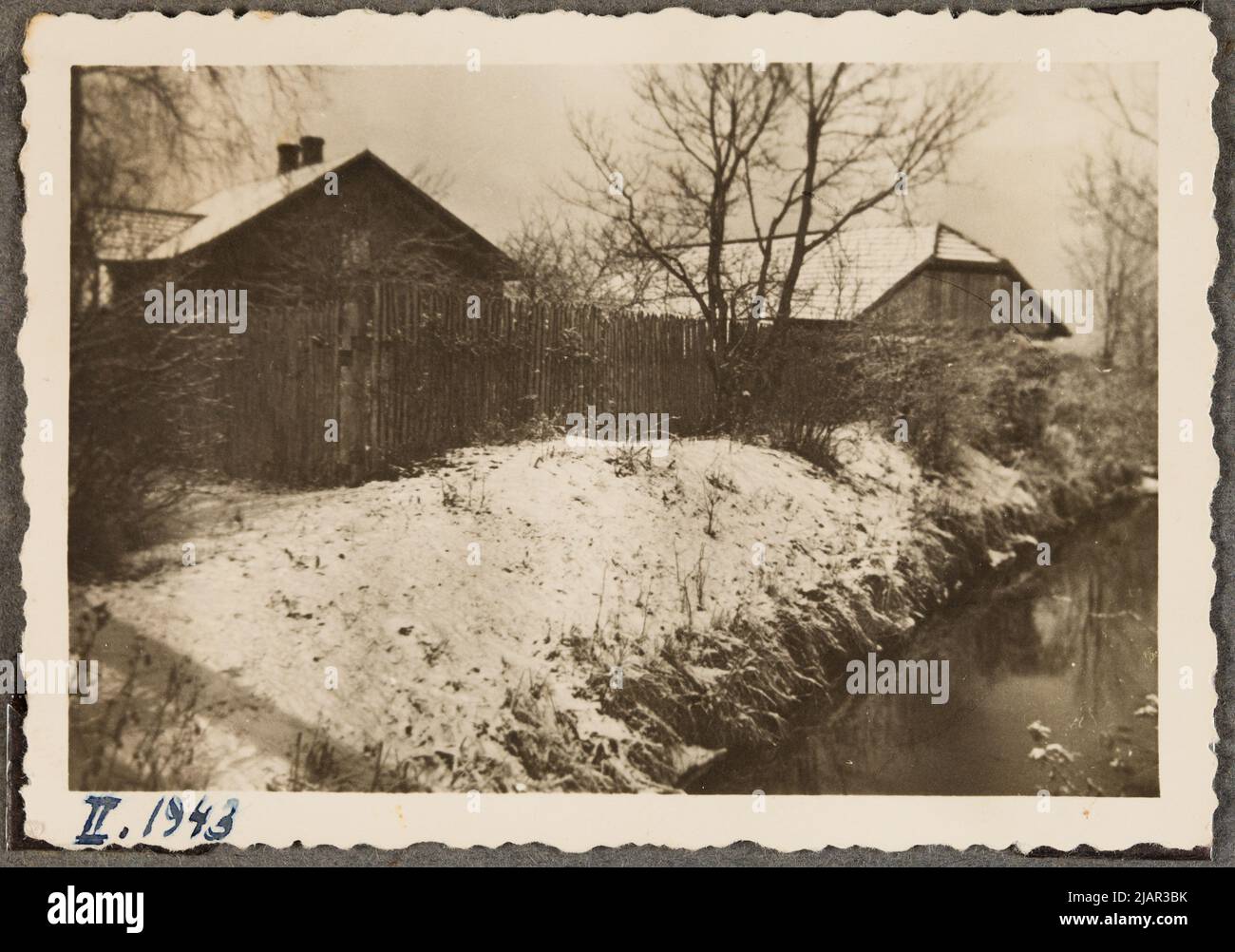 Winter landscape a village farm over a stream. Circle of the ...