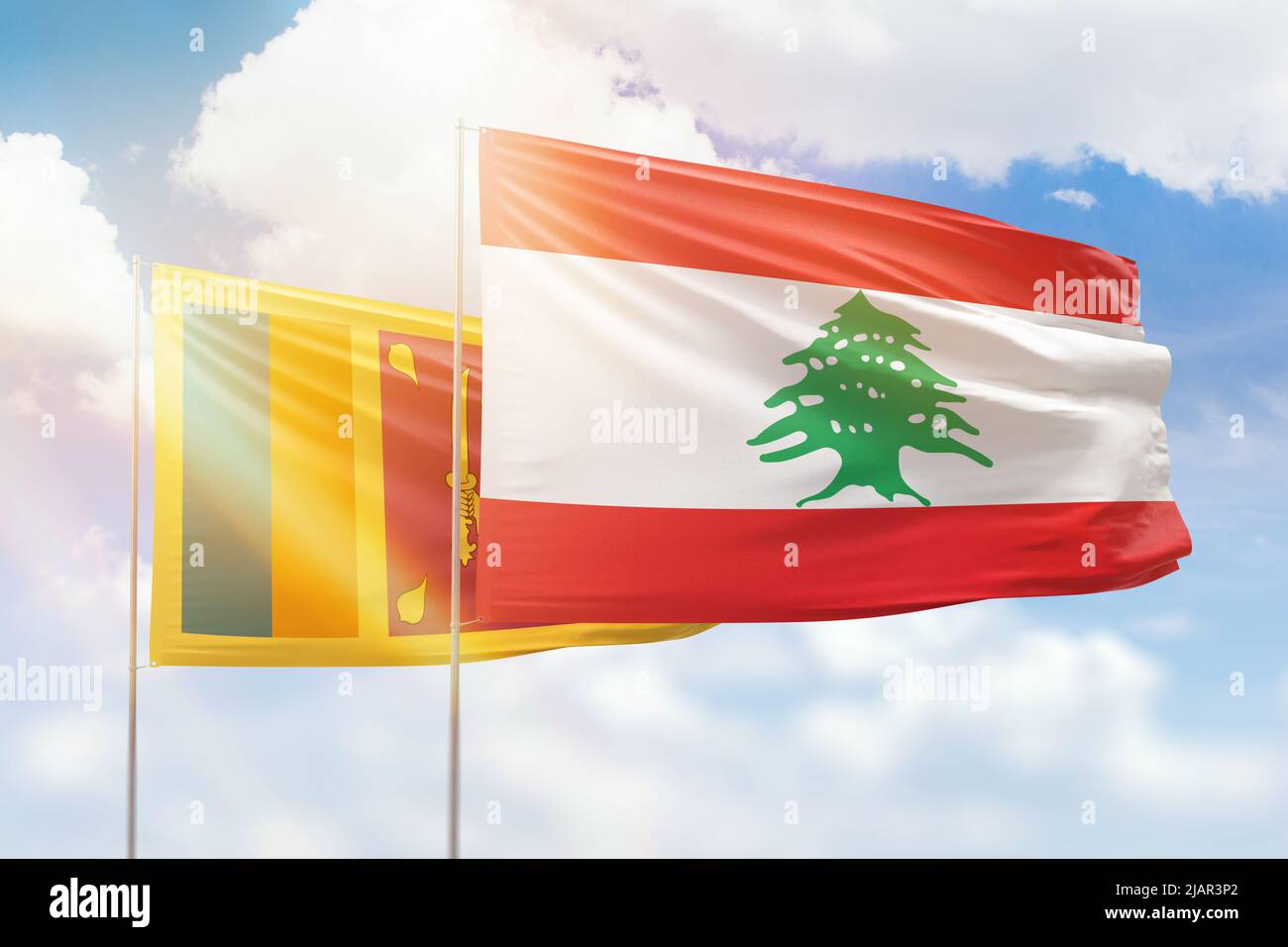 Sunny blue sky and flags of lebanon and sri lanka Stock Photo - Alamy