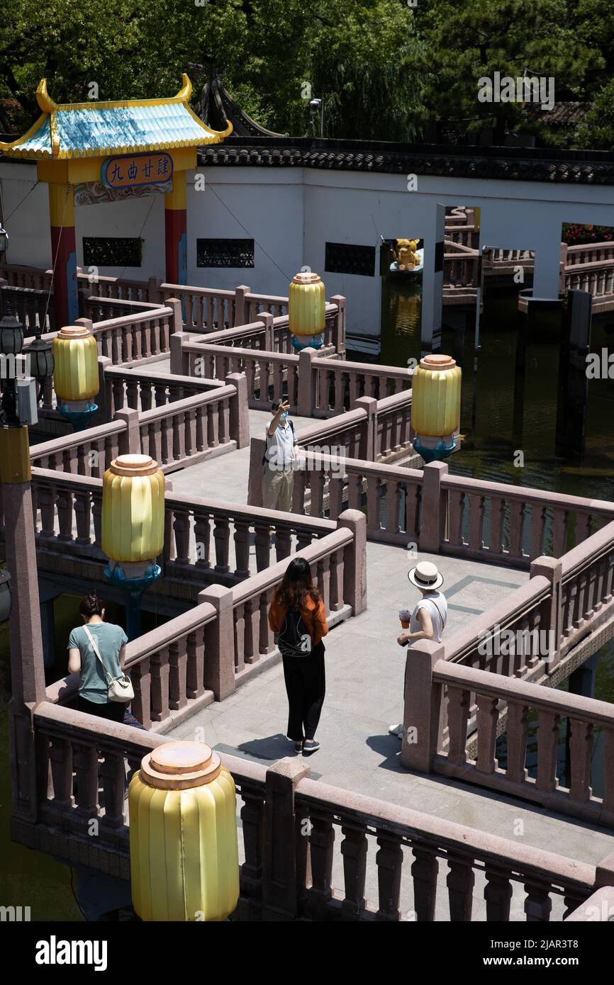 Shanghai, China. 31st May, 2022. Citizens take photos at the Jiuqu ...