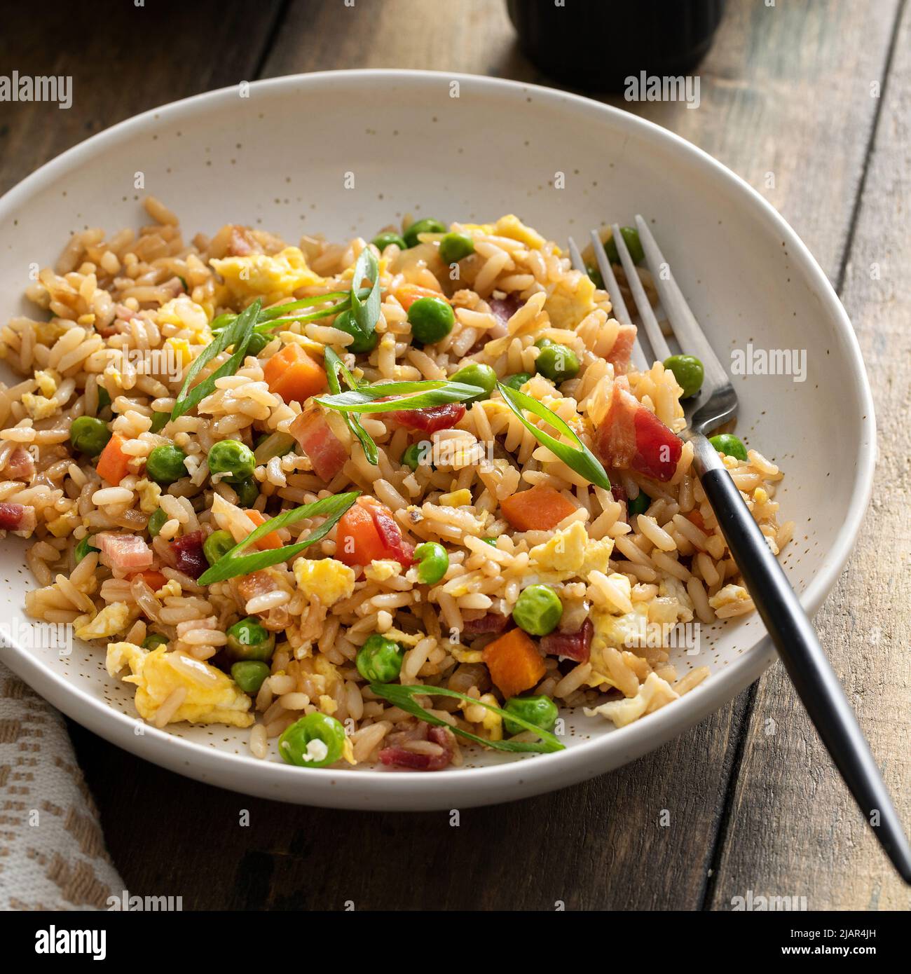 Breakfast fried rice with bacon and scrambled eggs Stock Photo - Alamy
