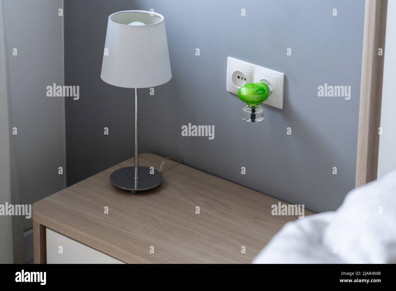 Liquid mosquito repellent in socket selective soft focus. Domestic ...