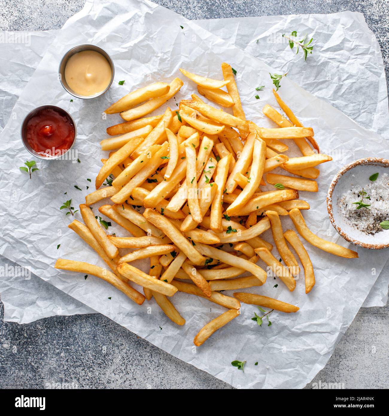 Traditional french fries with ketchup and honey mustard sauce Stock ...
