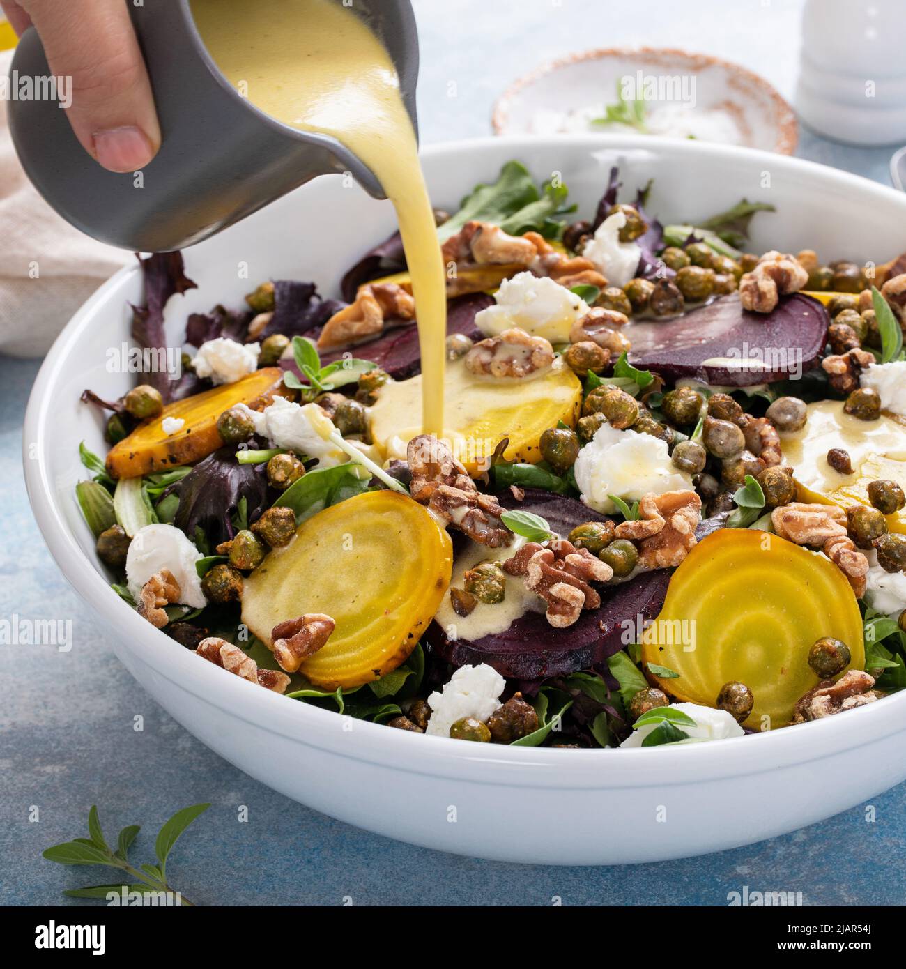 Beet salad with lemon dressing and roasted chickpeas Stock Photo - Alamy