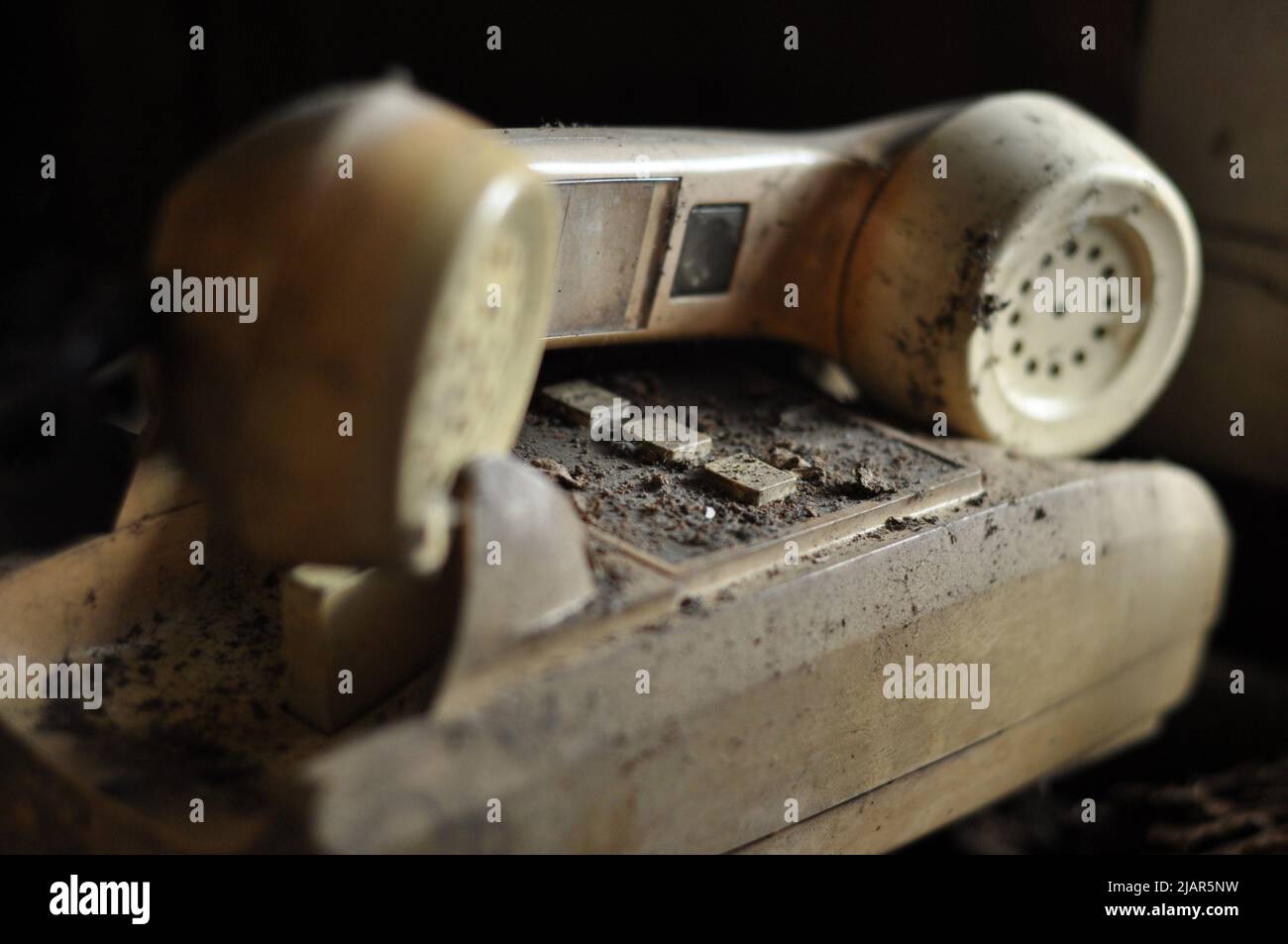 Close up of old damaged telephone on the abandoned deserted house Stock ...