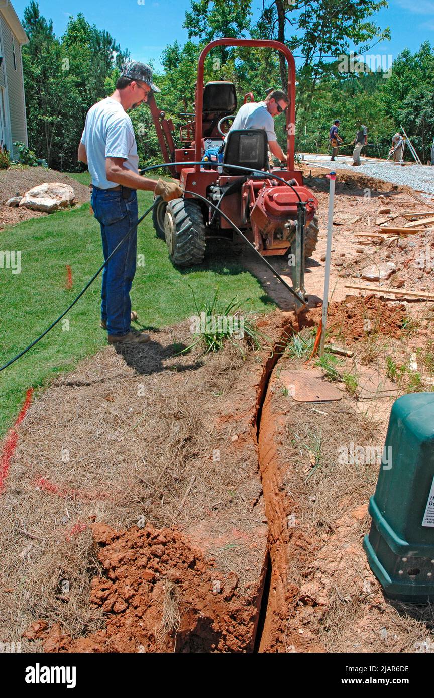 Installing underground TV and Phone cable line using "shaker" on ...