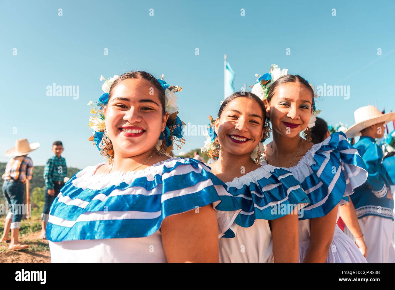 Girls with traditional clothes representing the culture of Latin ...