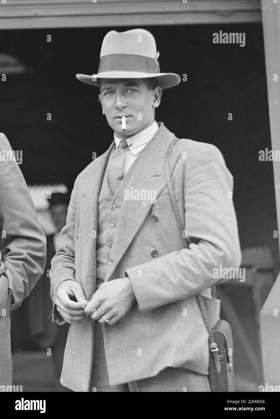 English cricketer Harold Larwood at a train station, New South Wales ca ...