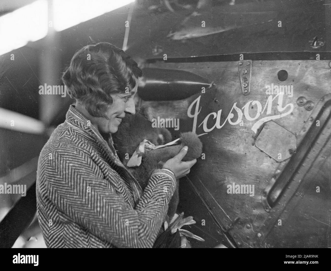 English aviator Amy Johnson in Australia with her airplane 'Jason' ca ...