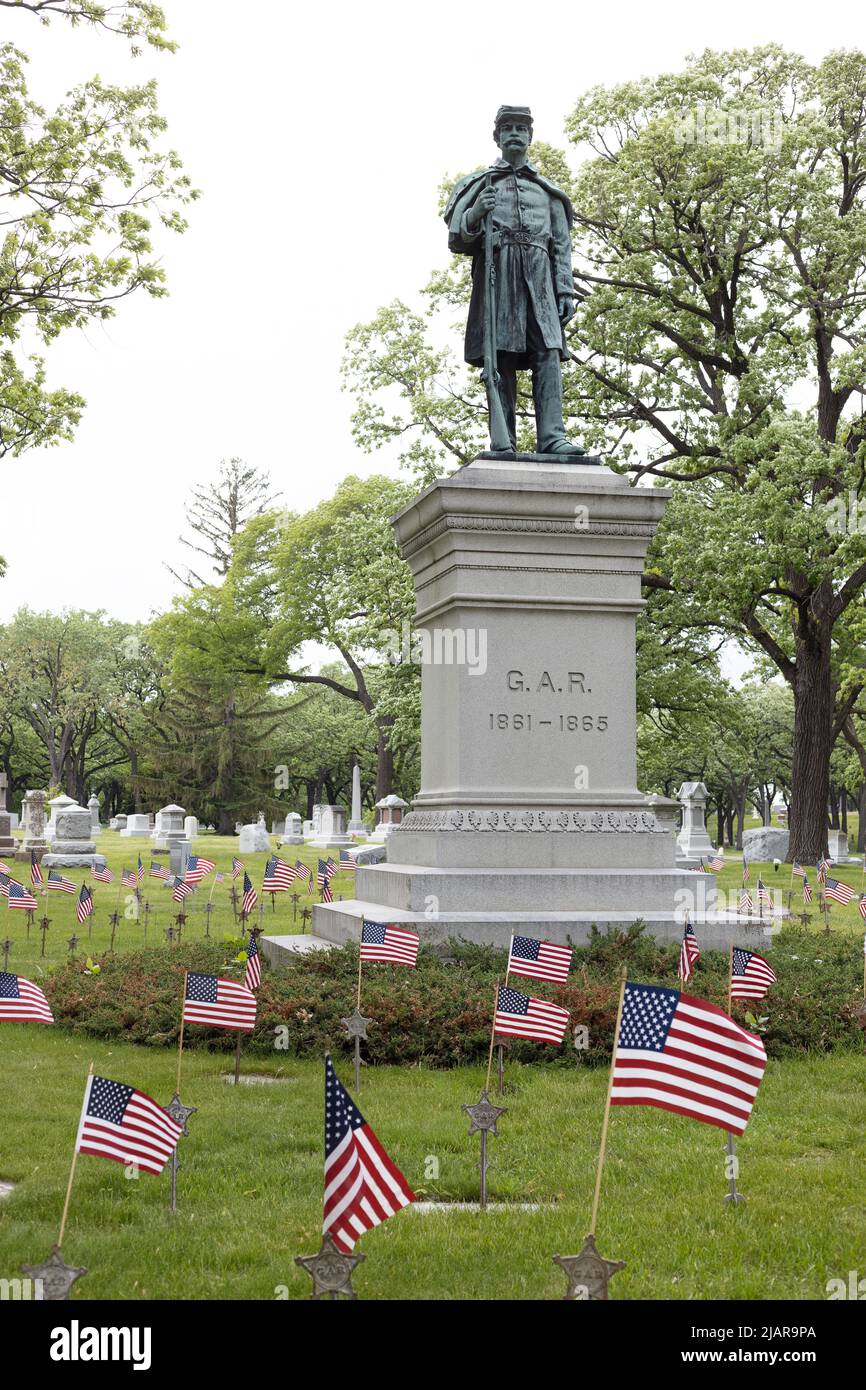 Flags flying on graves at the Grand Army of the Republic Memorial and ...