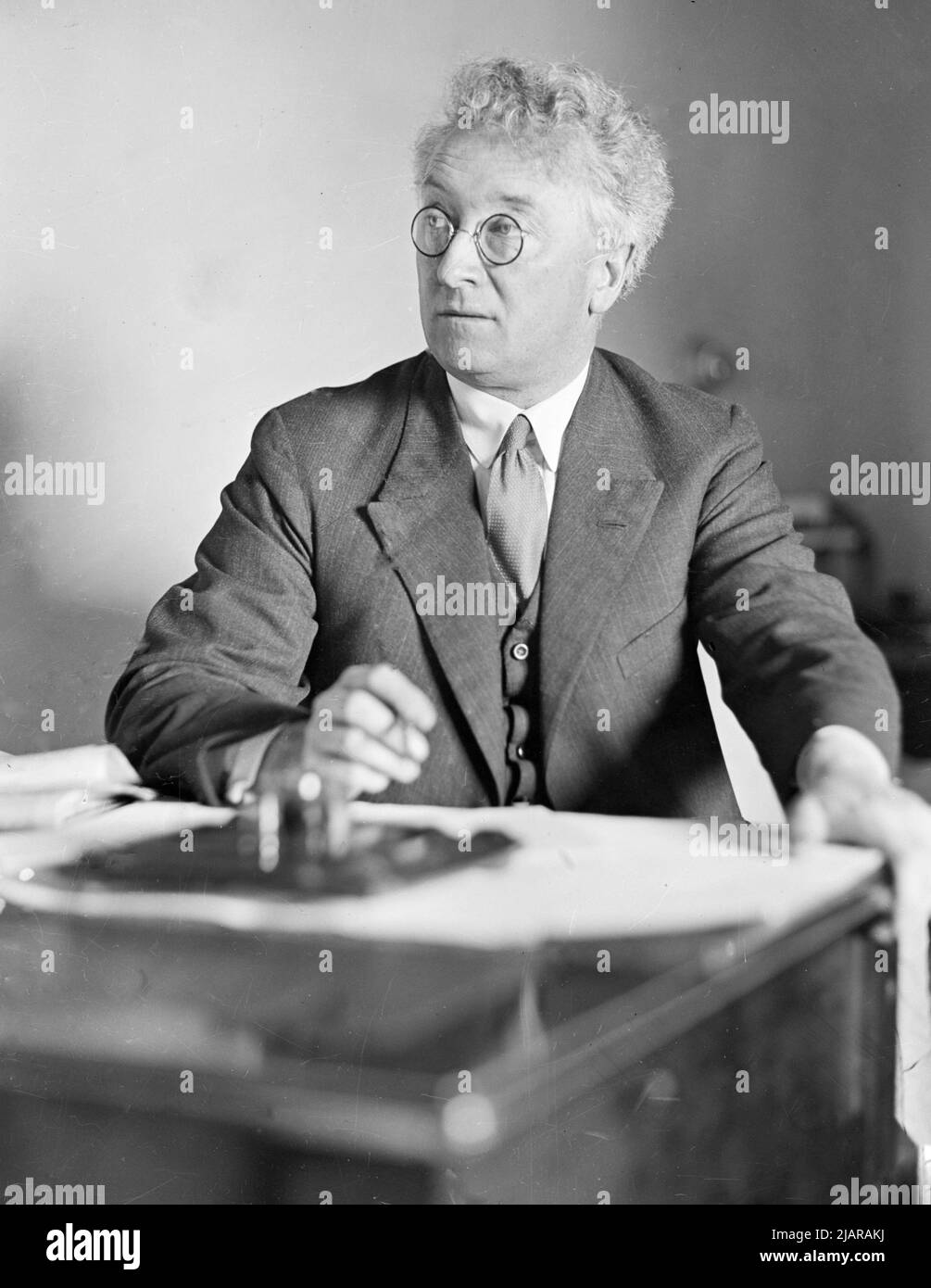 Joseph Lyons, Prime Minister of Australia, with reading glasses on ca ...
