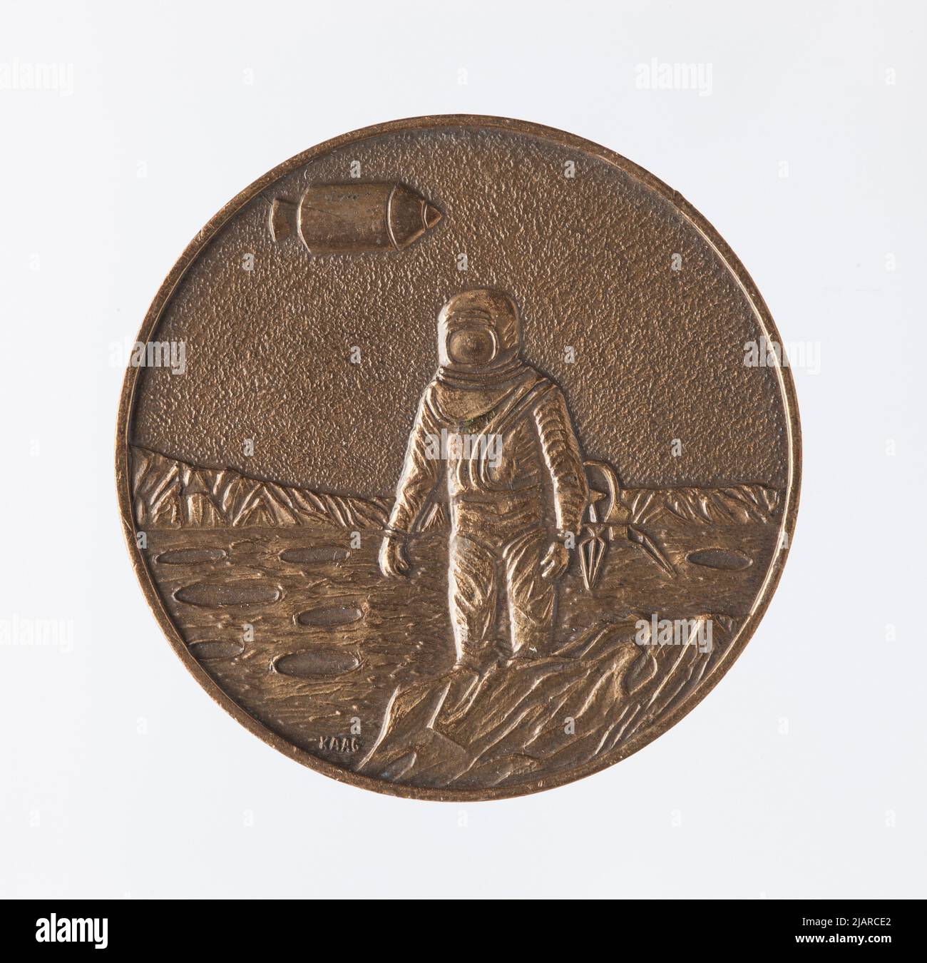 A medal commemorating the Apollo 11 mission and the first landing on ...