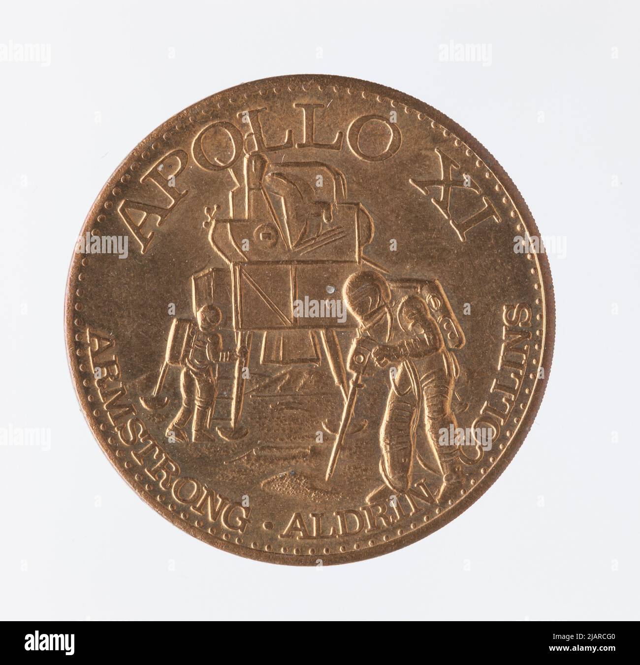 A medal commemorating the Apollo 11 mission and the first landing on ...