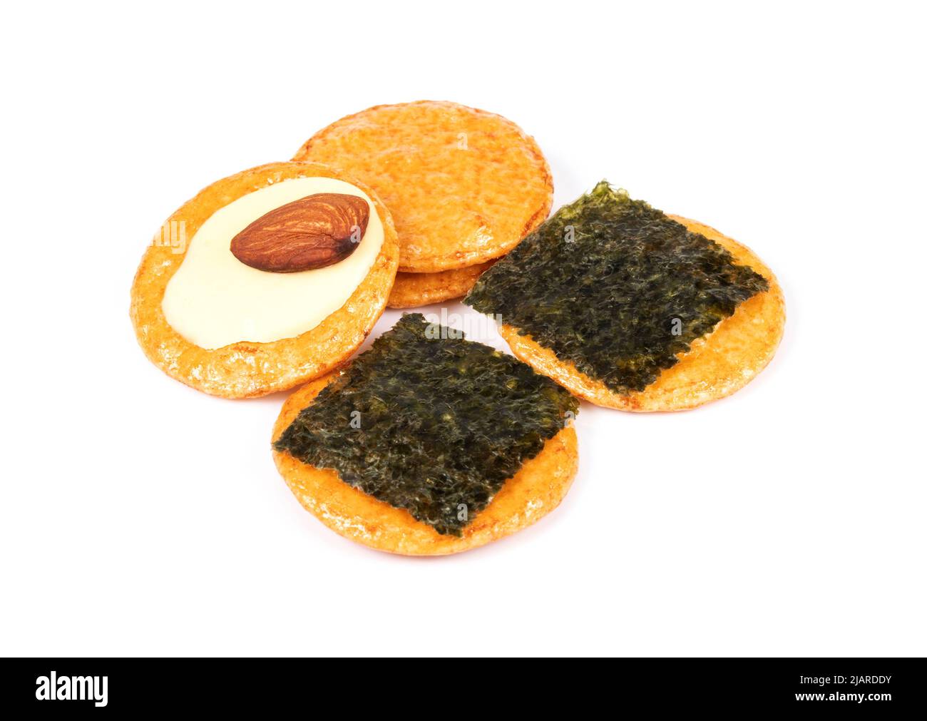 Japanese rice crackers on white background Stock Photo - Alamy