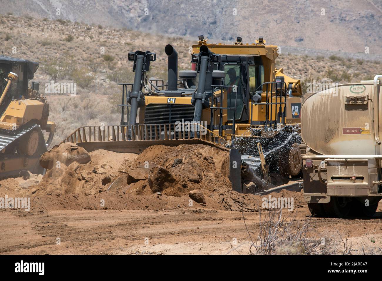 These bulldozers are working on a new road project near Olancha, Inyo ...