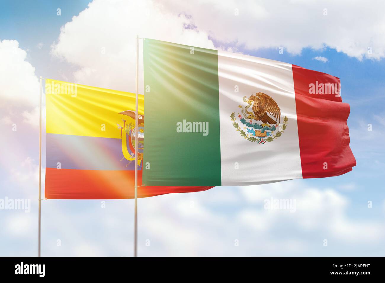 Sunny blue sky and flags of mexico and ecuador Stock Photo - Alamy