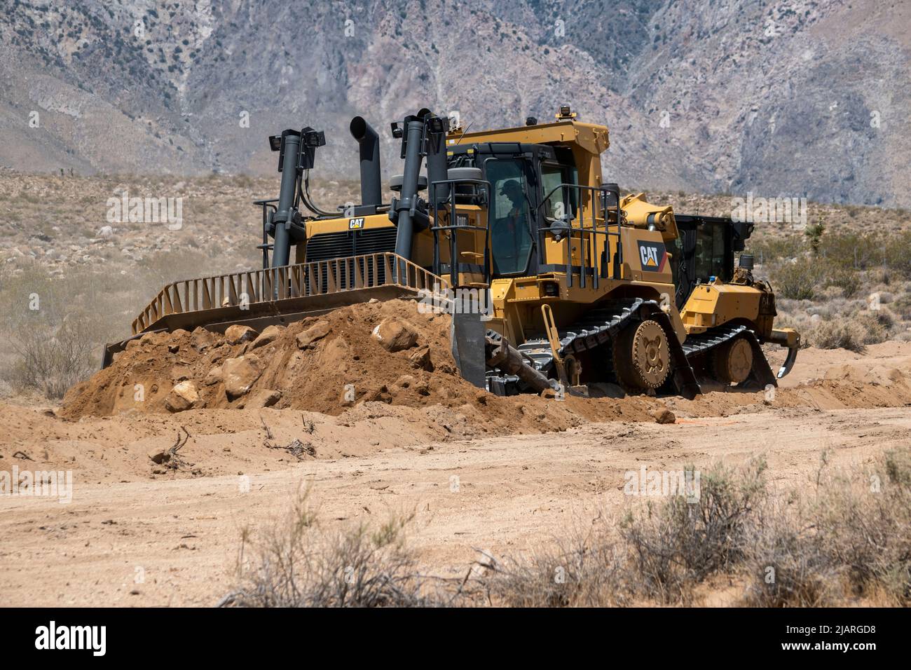 These bulldozers are working on a new road project near Olancha, Inyo ...