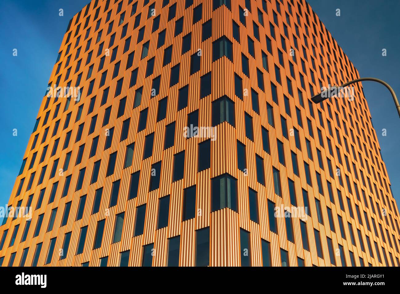 Modern office building exterior with glass facade on clear sky ...