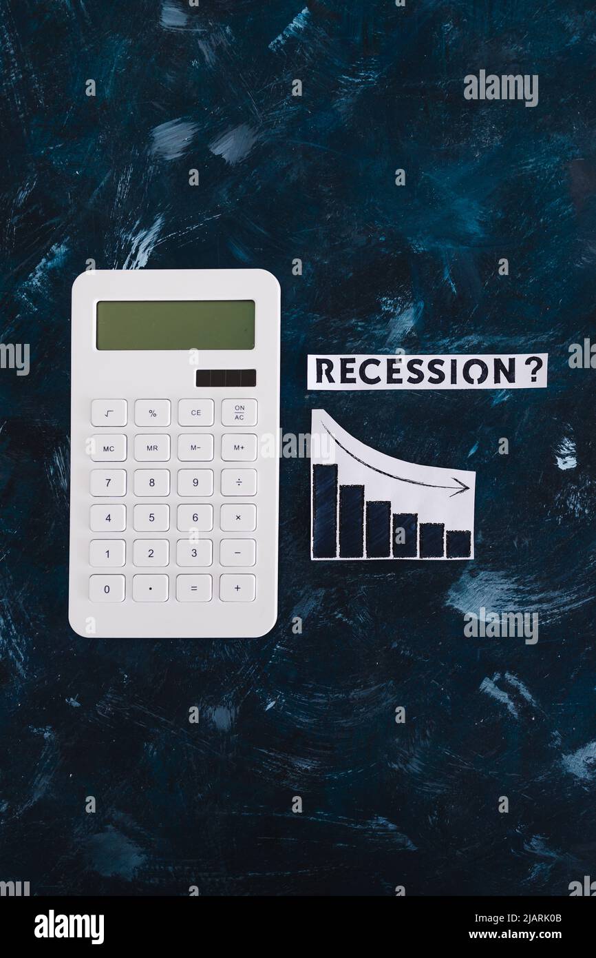 recession and stagnating economy conceptual image with text next to ...