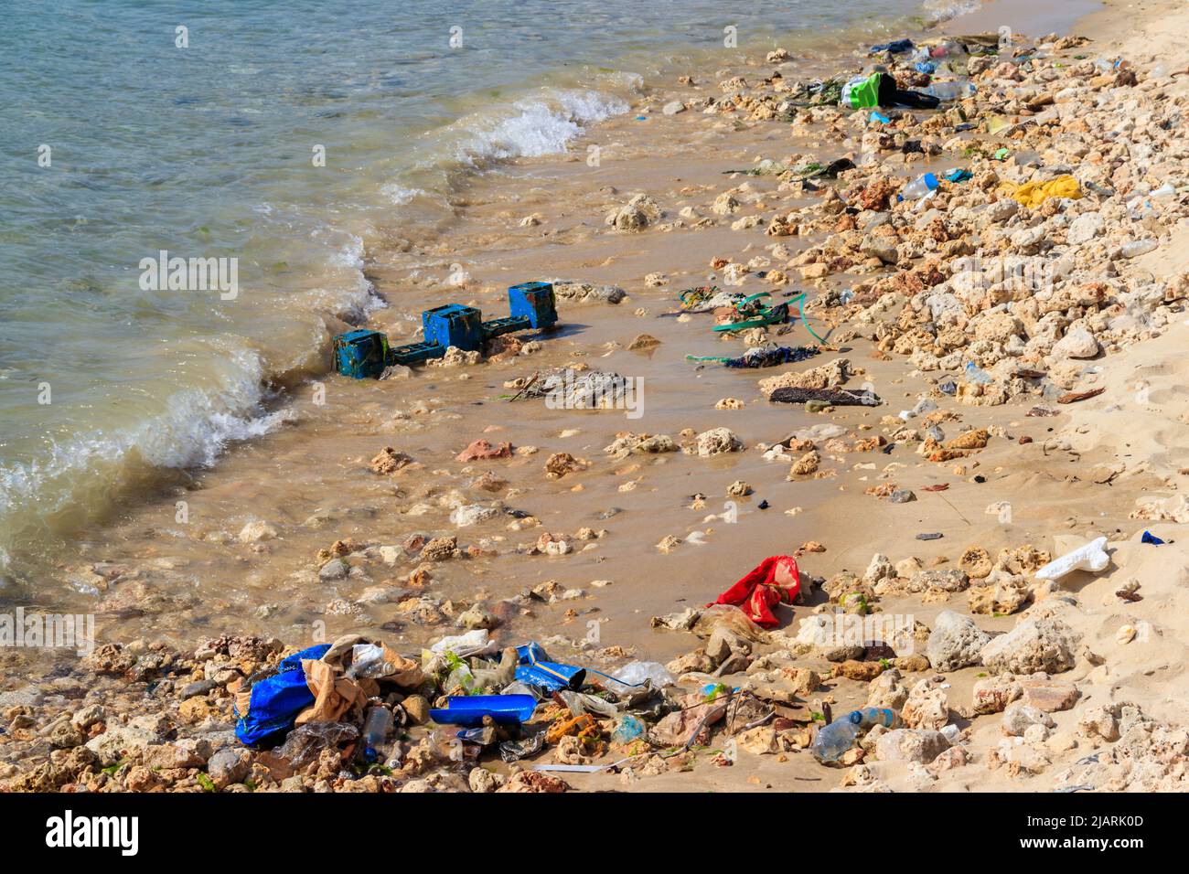 Garbage on a bank of ocean. Pollution of sea, ocean water with waste ...