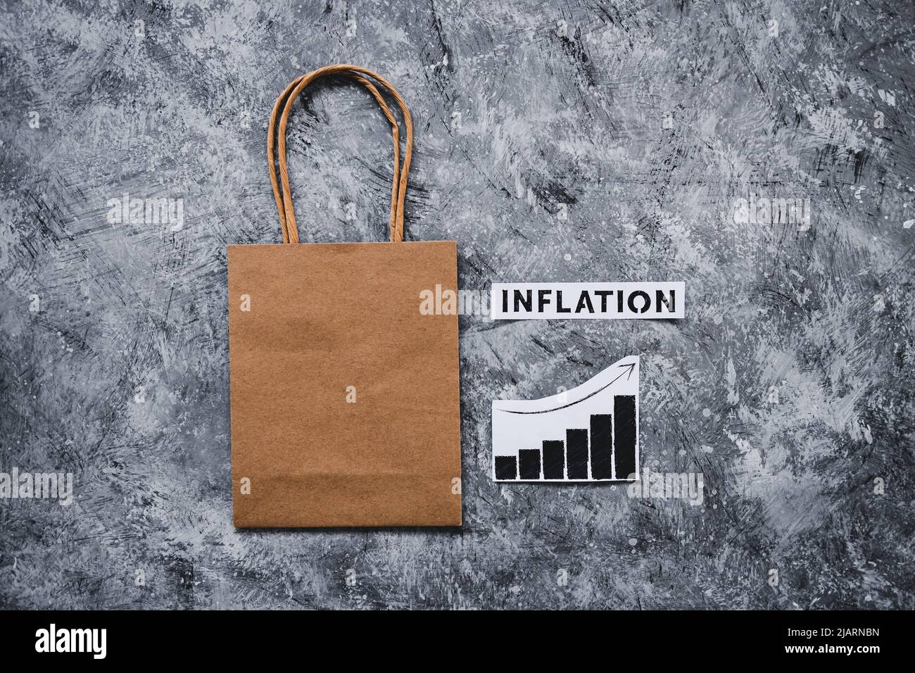 inflation and stagnating economy conceptual image with text over ...