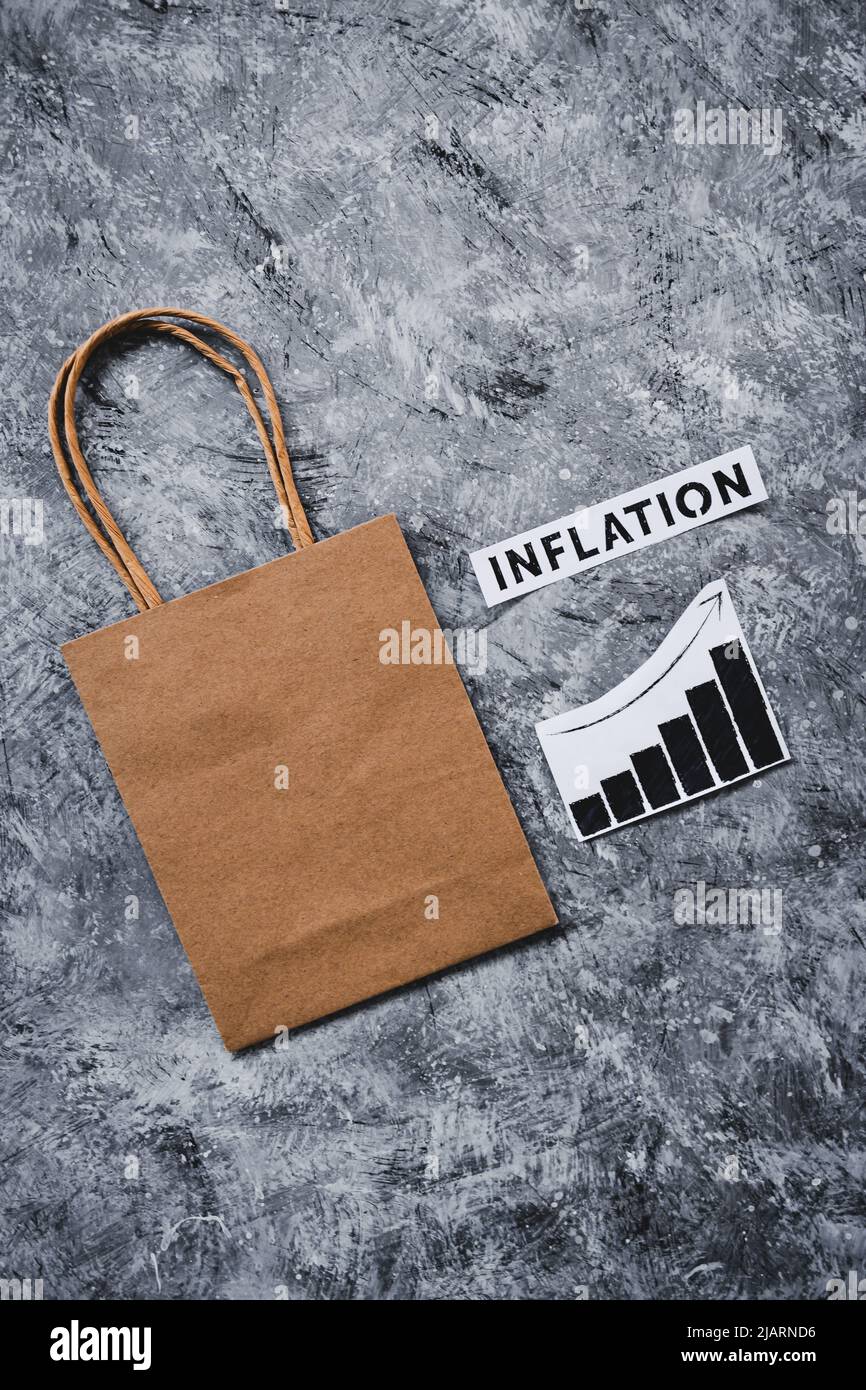 inflation and stagnating economy conceptual image with text over ...