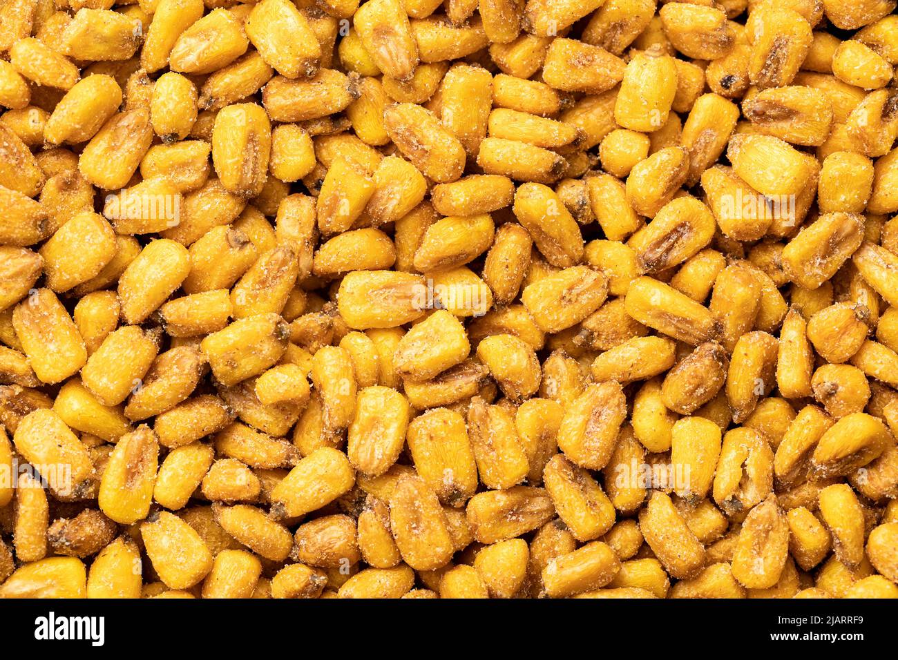 Roasted salted corn snack. Pattern of yellow corn seed. Top view Stock ...