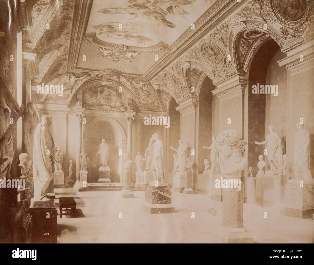 PARIS The Louvre hall with ancient Roman sculptures unknown Stock Photo ...