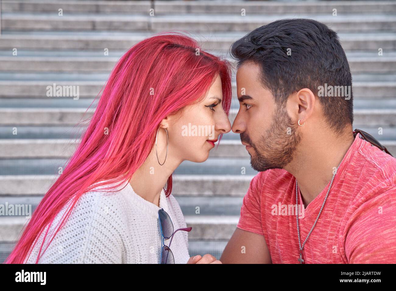 Close-up view of a couple looking into each other eyes. Love and ...