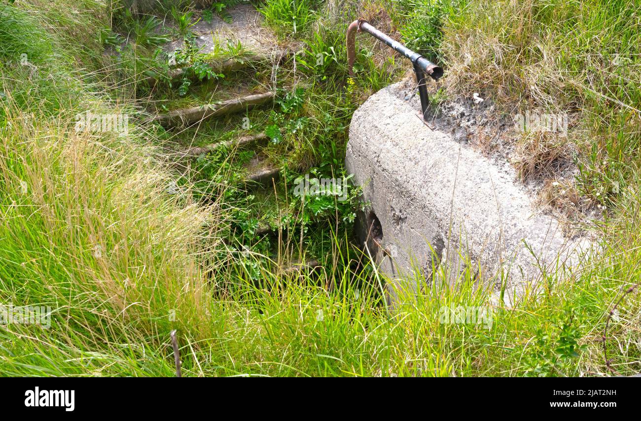 Entrance to an old bunker from WW2, used by the dutch and the germans ...