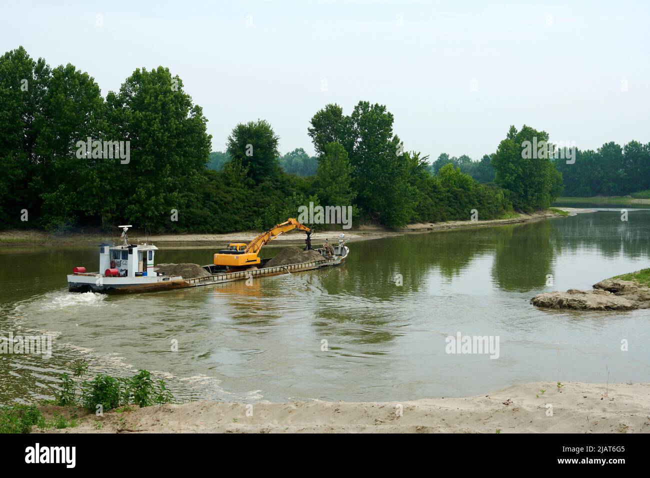 Soarza (Pc), Italy, a barge to dig sund on the river Po Stock Photo - Alamy