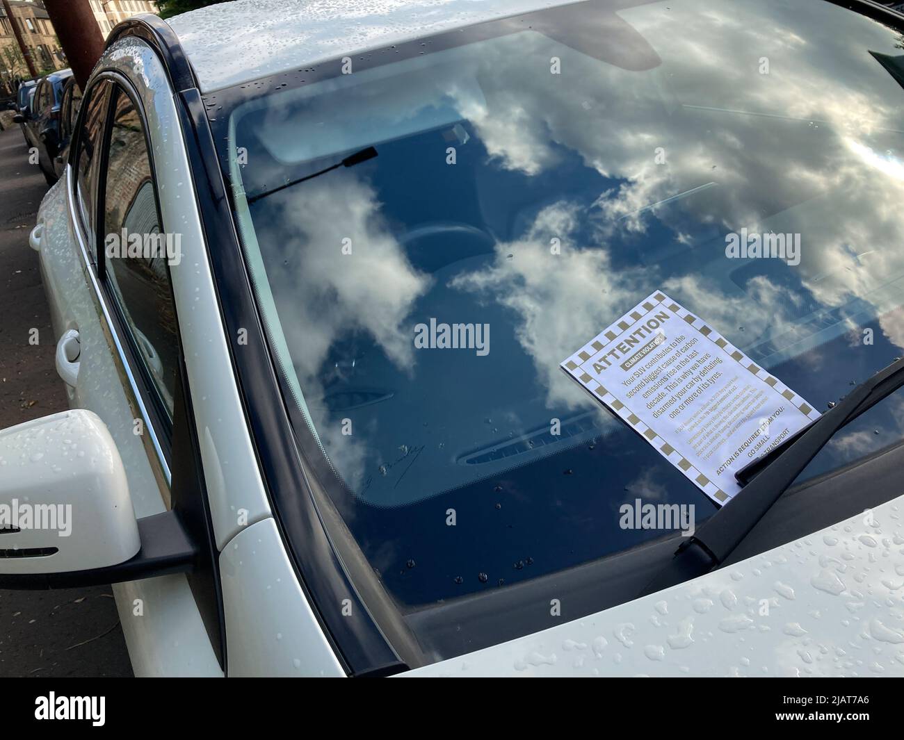 Glasgow, Scotland, 1st June 2022. Two SUV cars sits with a tyre cut on ...