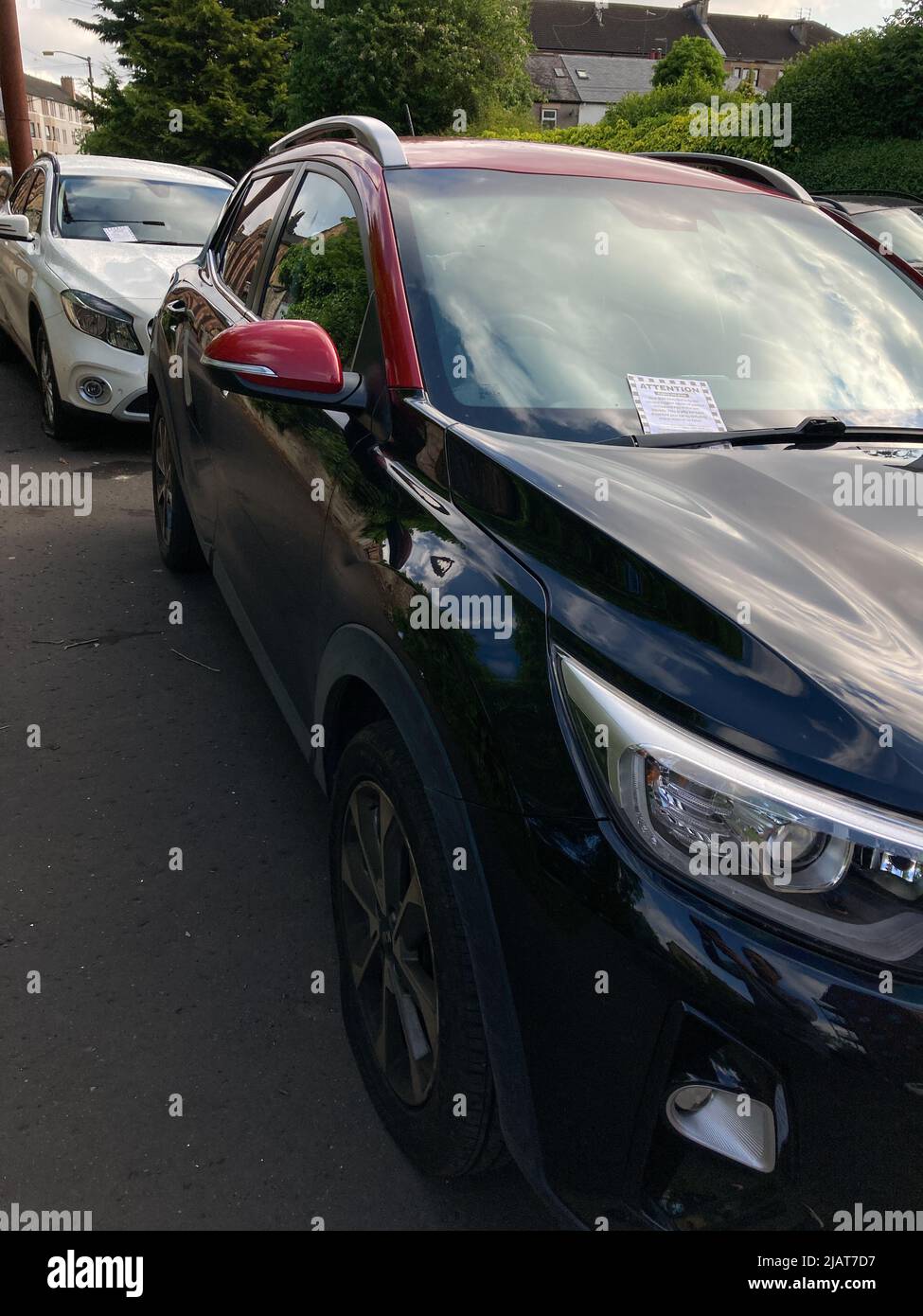 Glasgow, Scotland, 1st June 2022. Two SUV cars sits with a tyre cut on ...