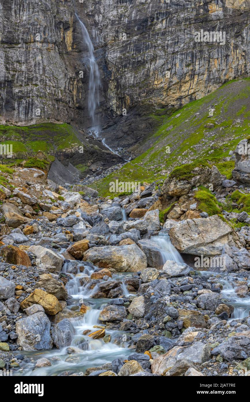 Typical alpine landscape with waterfalls, Swiss Alps near ...
