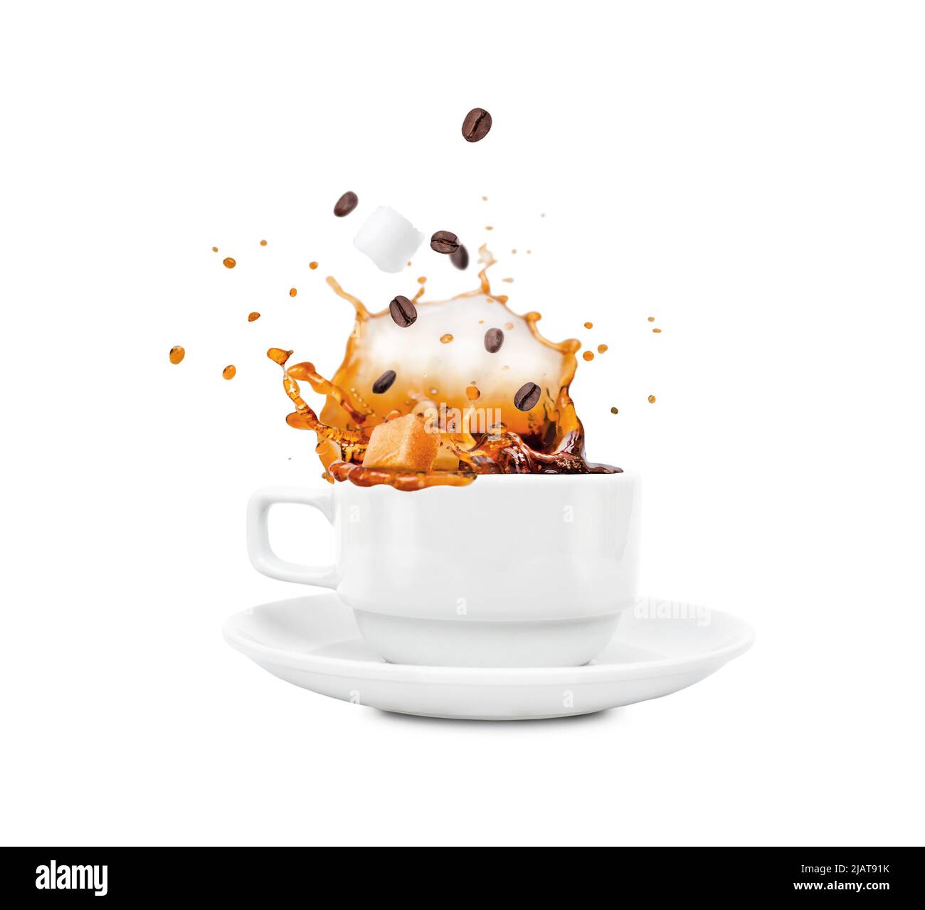 Sugar and coffee grains fly into a cup of coffee with splashes isolated ...