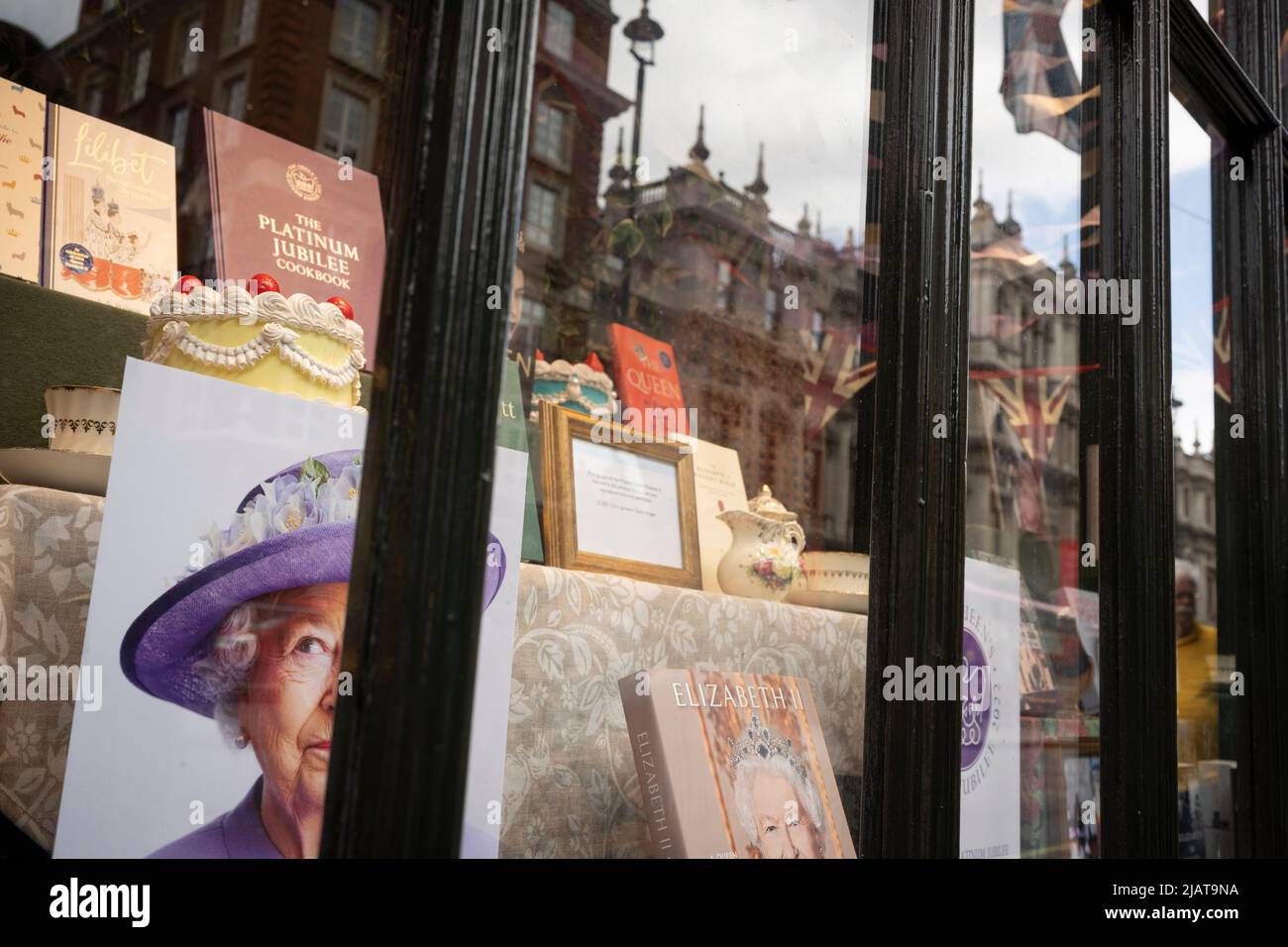 The face of the Queen forms part of a display of royal merchandise in ...