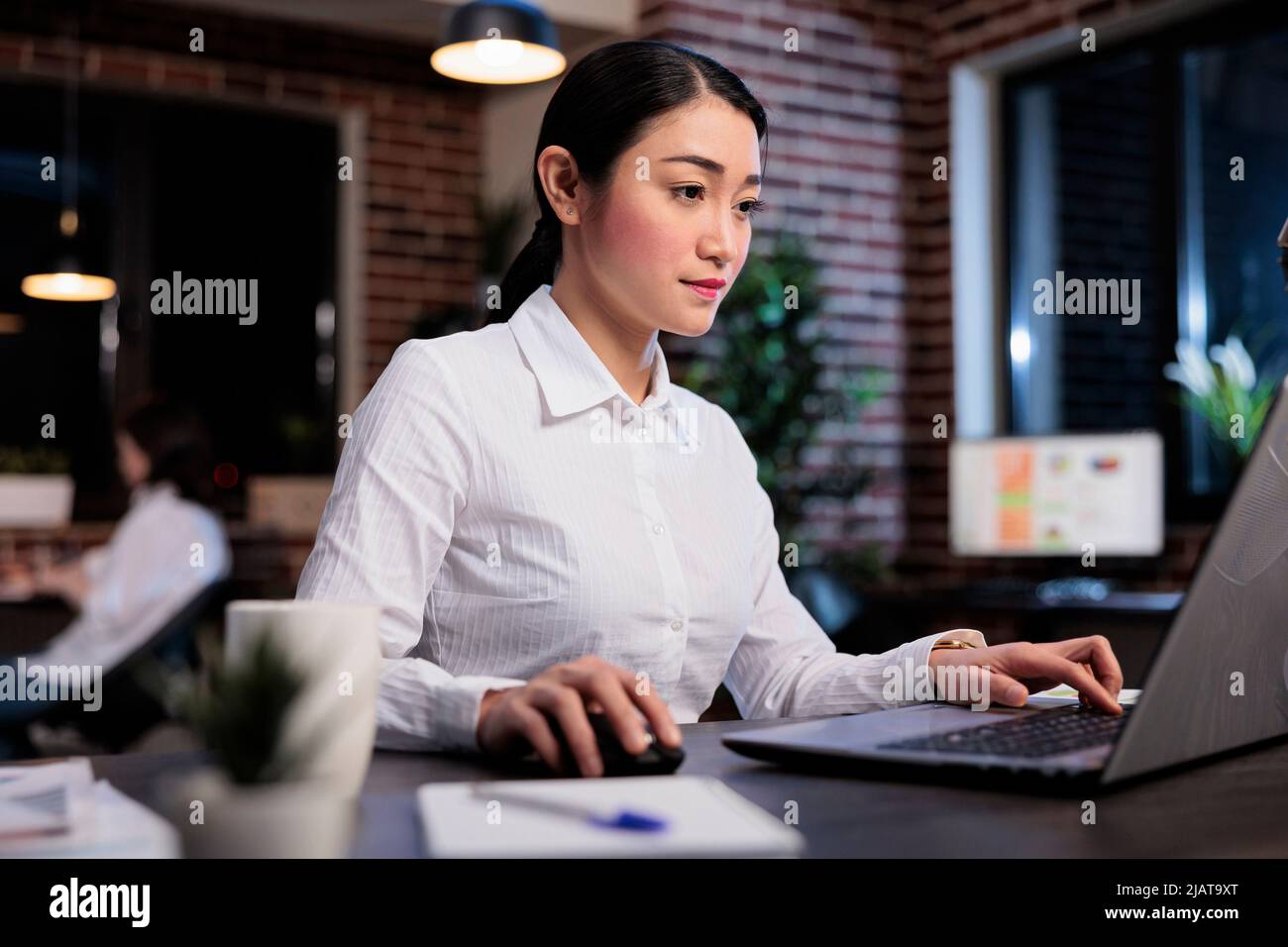 Corporate employees reviewing documentation hi-res stock photography ...