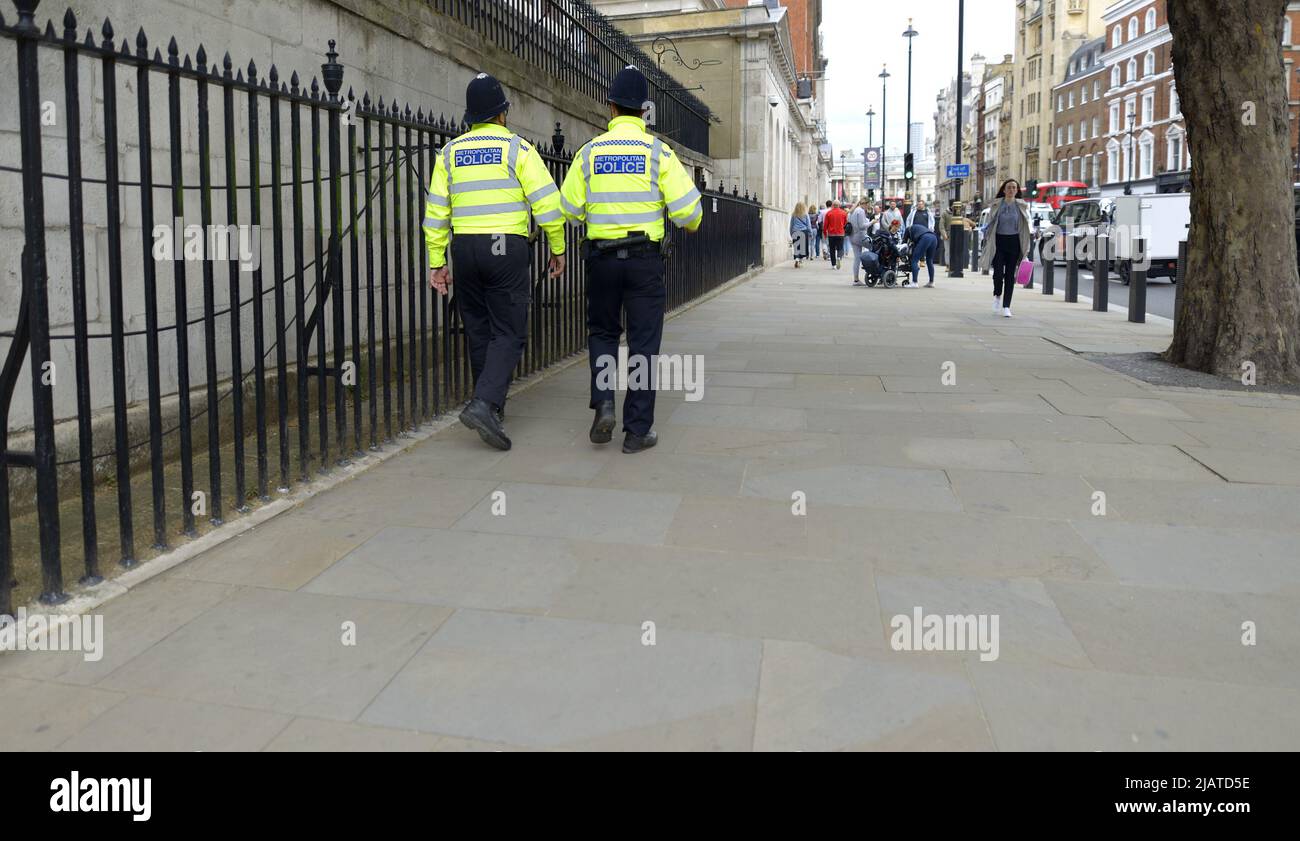 Policeman london walking hi-res stock photography and images - Alamy